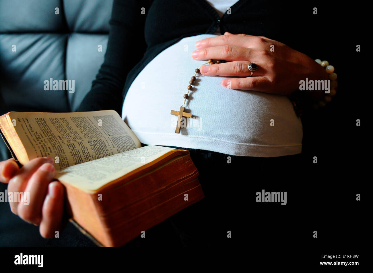 Christian pregnant woman reading the Bible Stock Photo - Alamy