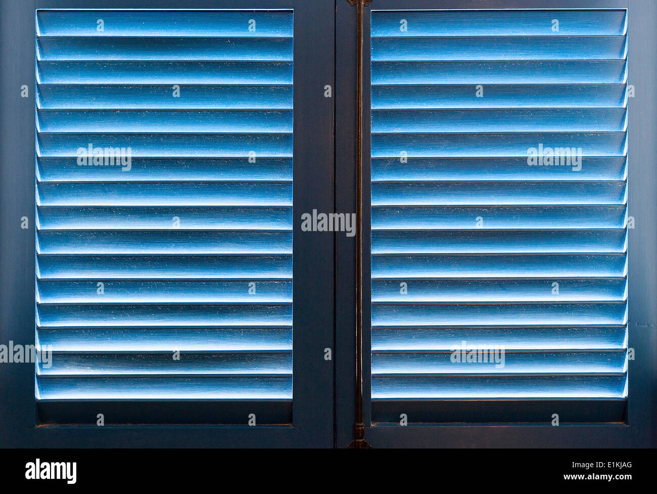 Blue window shutters Stock Photo - Alamy