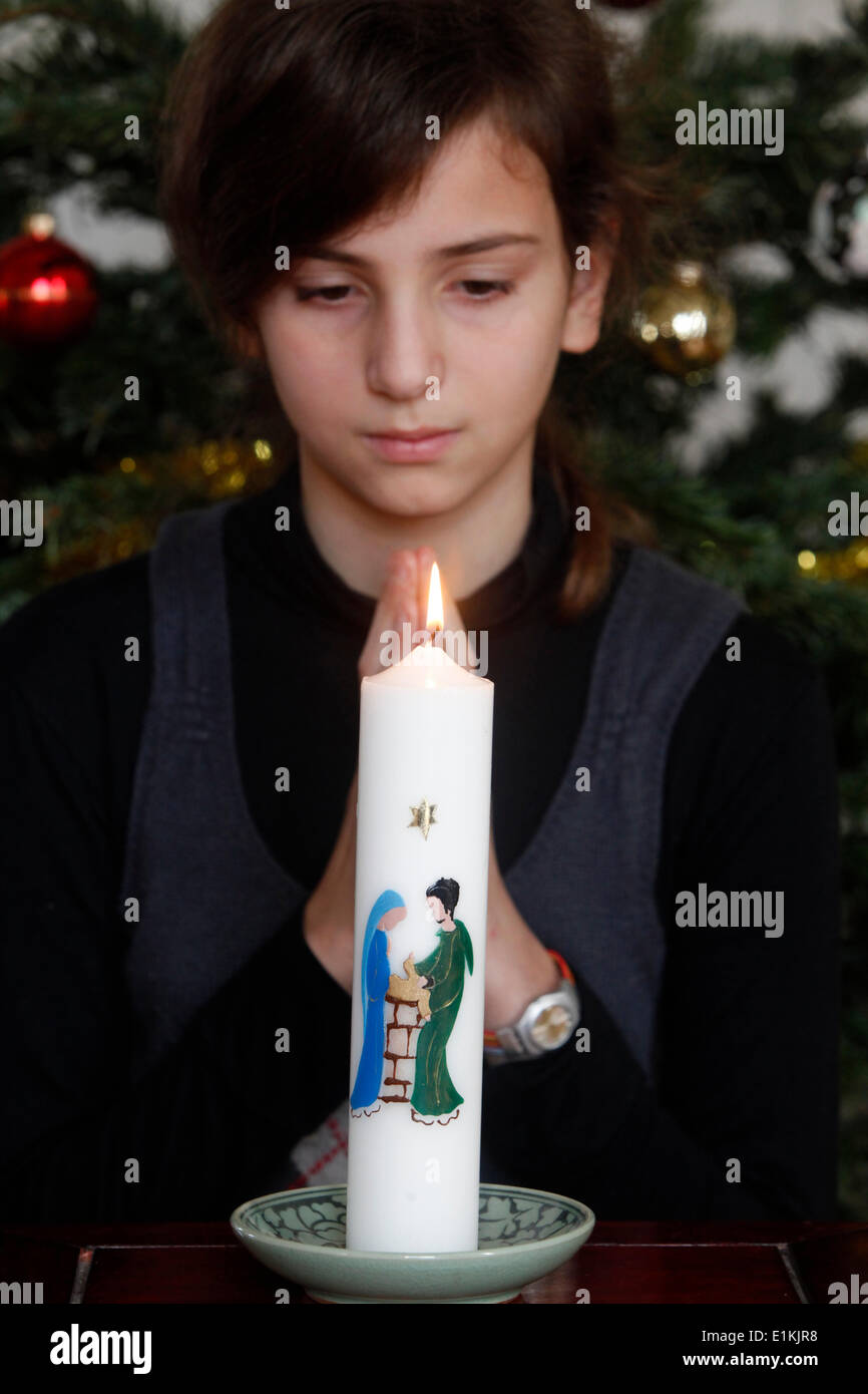 Girl with Advent candle Stock Photo - Alamy
