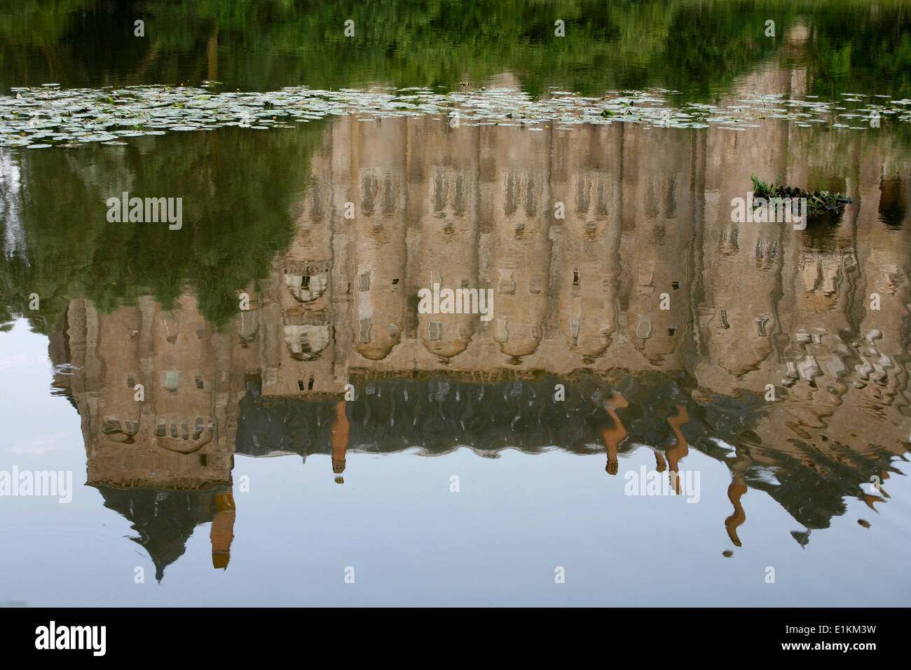 Saint-Pierre de Solesmes abbey reflected in the Sarthe river Stock ...