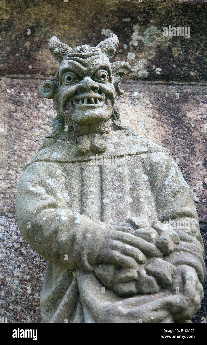 Plougonven calvary. The divil Stock Photo - Alamy