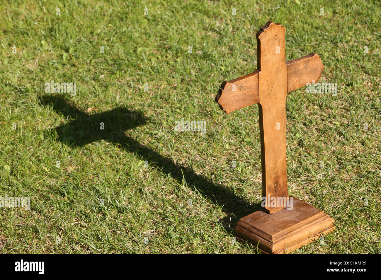 Christian cross on grass Stock Photo - Alamy