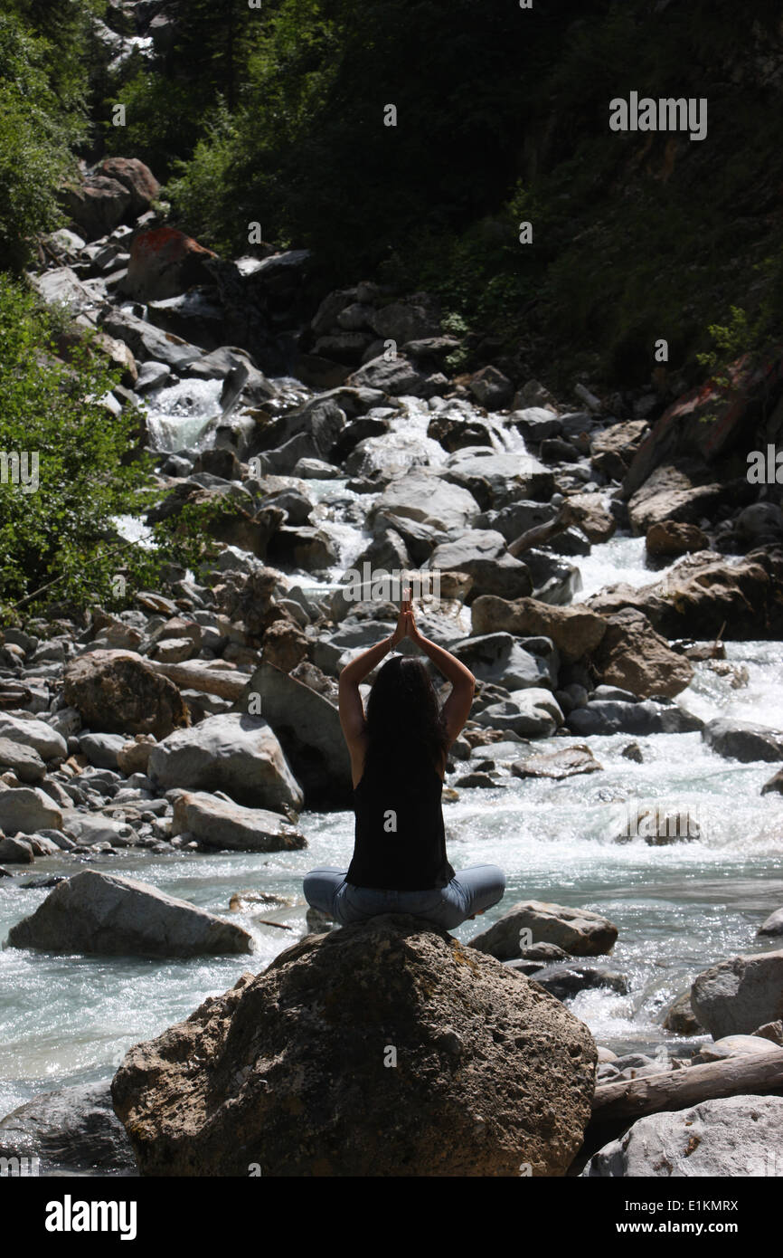 Woman praying outside Stock Photo - Alamy