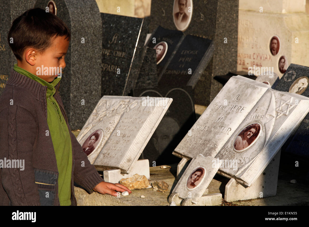 Boy in a cemetery Stock Photo - Alamy