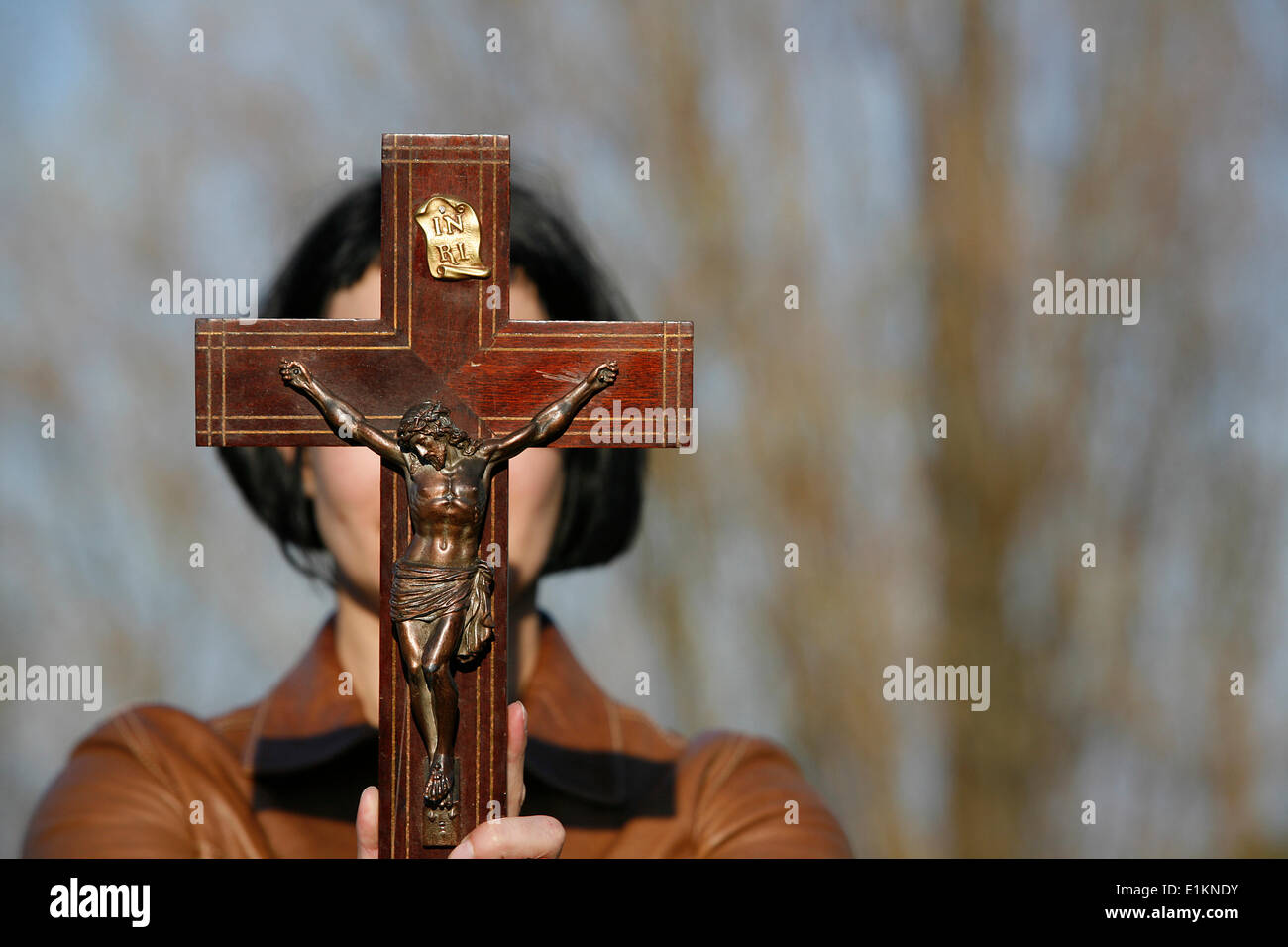 Jesus christ holding a cross hi-res stock photography and images - Alamy