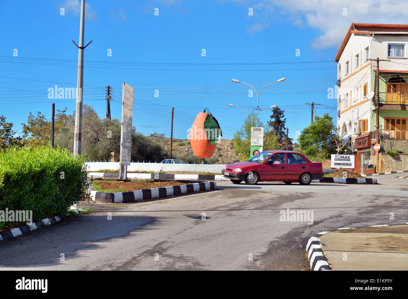 Orange monument in Lefka town center, representing its rich orange ...