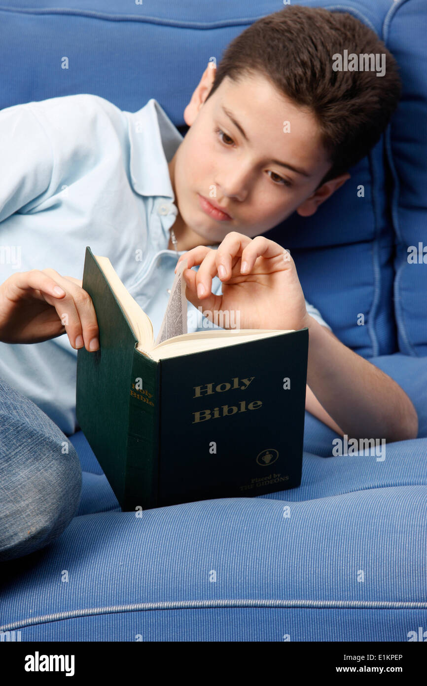 Child reading bible hi-res stock photography and images - Alamy
