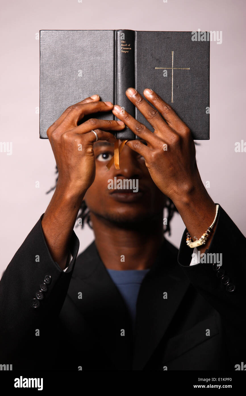 Evangelical christian holding a bible Stock Photo - Alamy