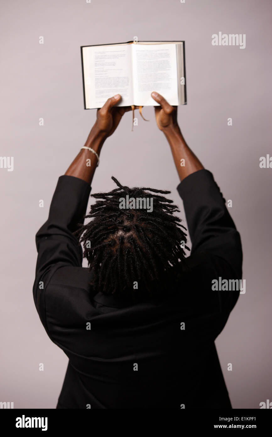 Evangelical christian holding a bible Stock Photo - Alamy
