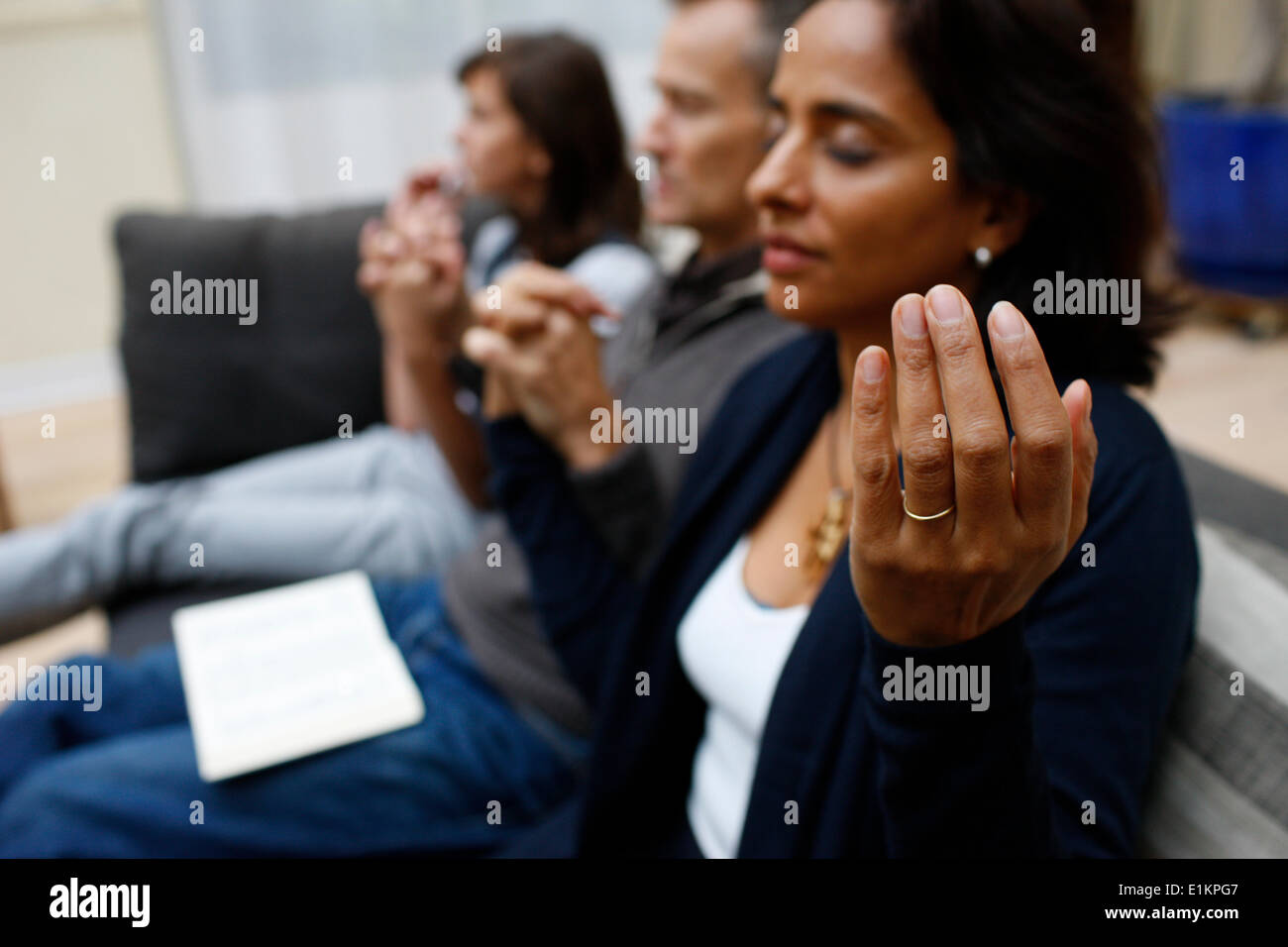 Family praying at home Stock Photo - Alamy