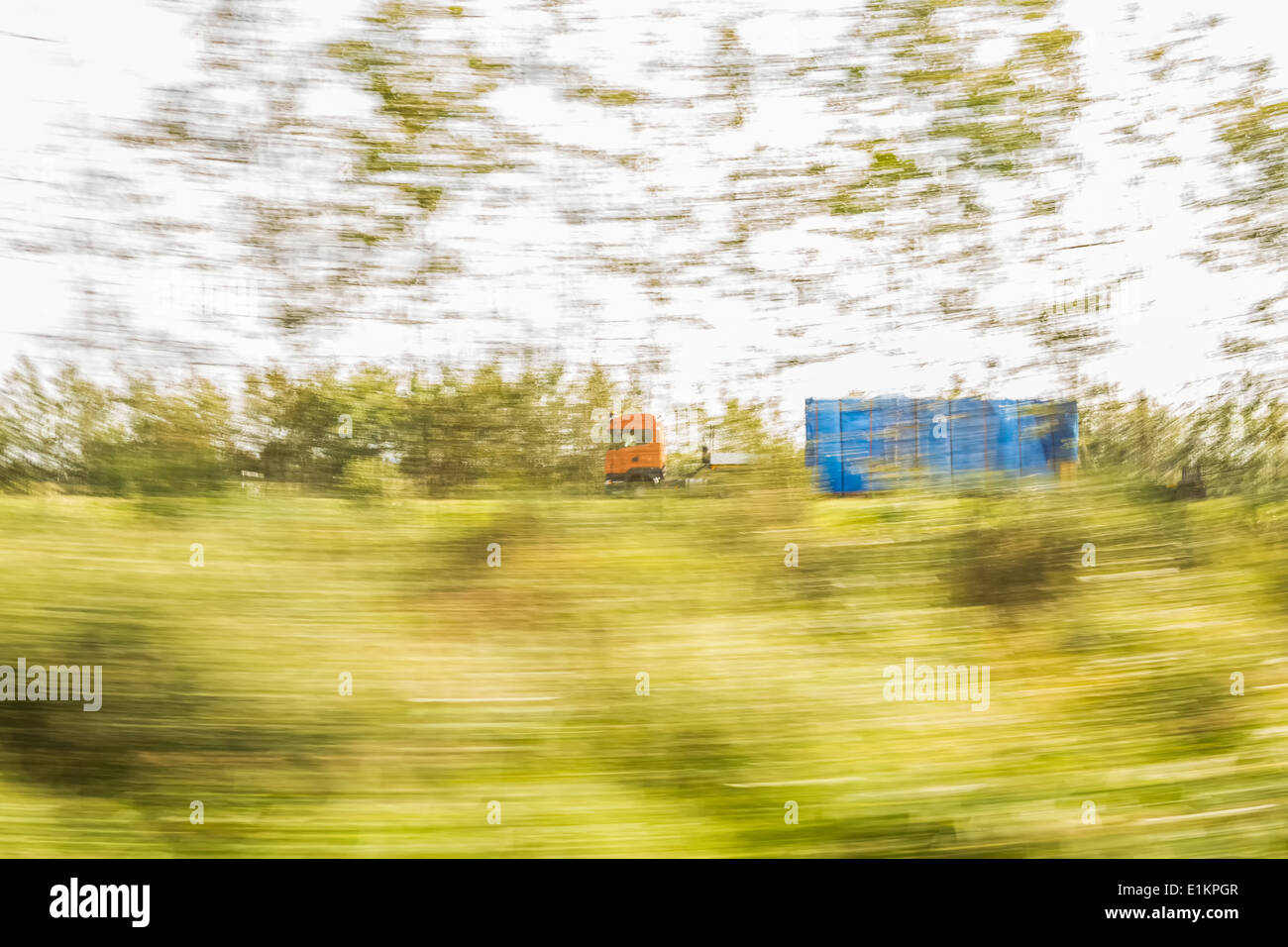 Truck delivery oversized cargo behind the trees Stock Photo - Alamy