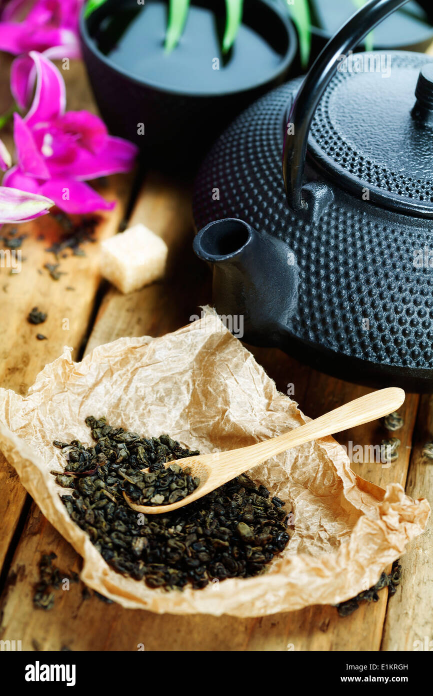 Asian tea set on an old wooden table Stock Photo - Alamy