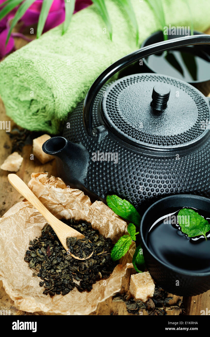 asian tea set and spa settings on wooden board Stock Photo - Alamy