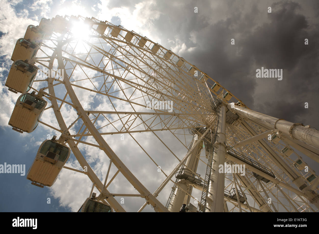 Ferris wheel over cloudy sky, at the fair in Cordoba Stock Photo - Alamy