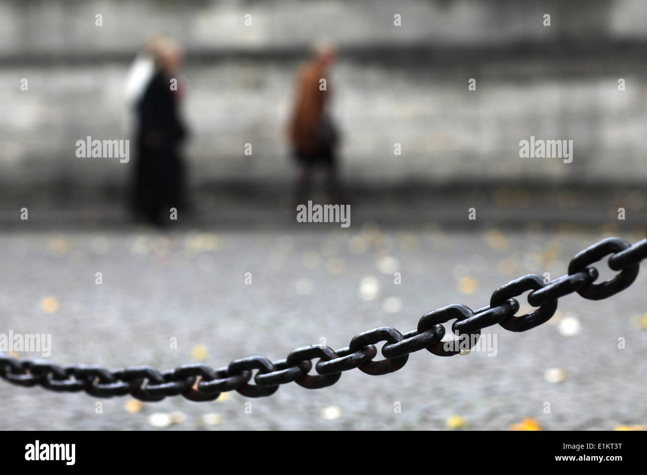 Chain & figures Stock Photo - Alamy