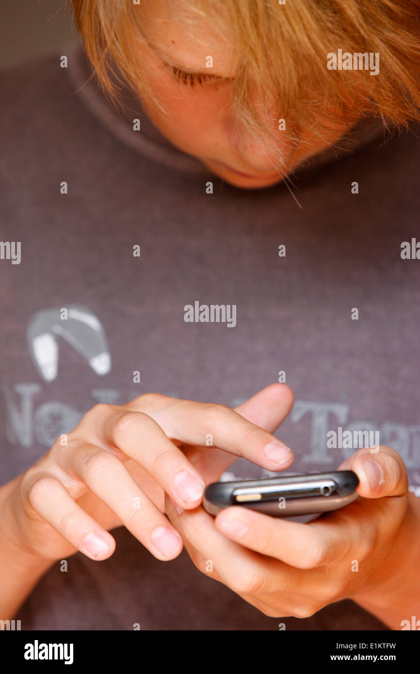 Child using an Iphone Stock Photo - Alamy