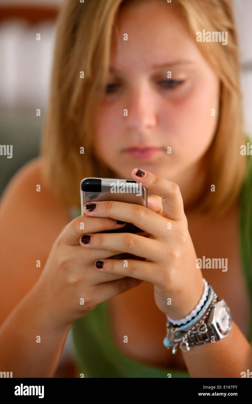 Child using an Iphone Stock Photo - Alamy