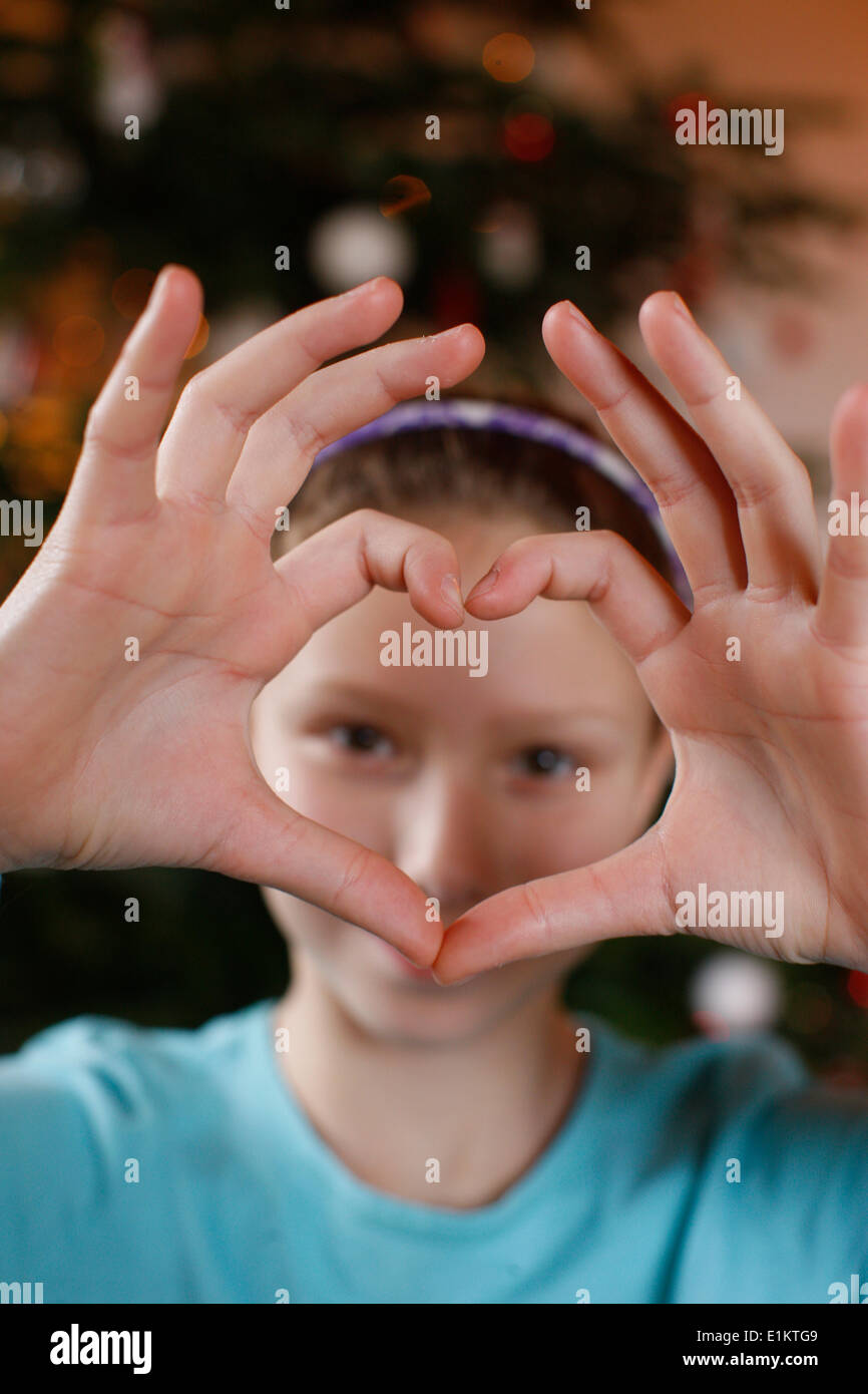 Girl heart sign hi-res stock photography and images - Alamy