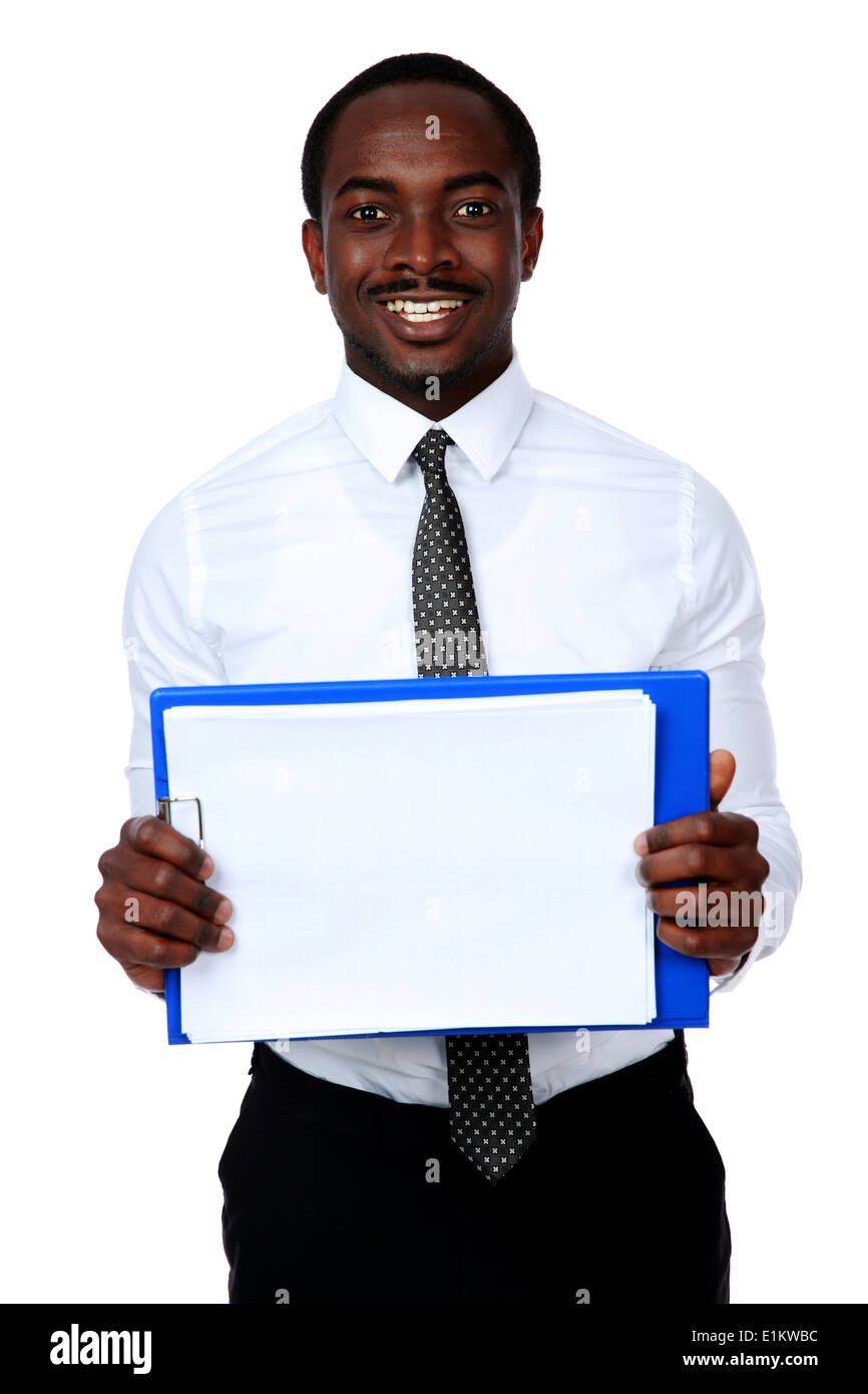 Happy african man holding folder and showing blank document Stock Photo ...