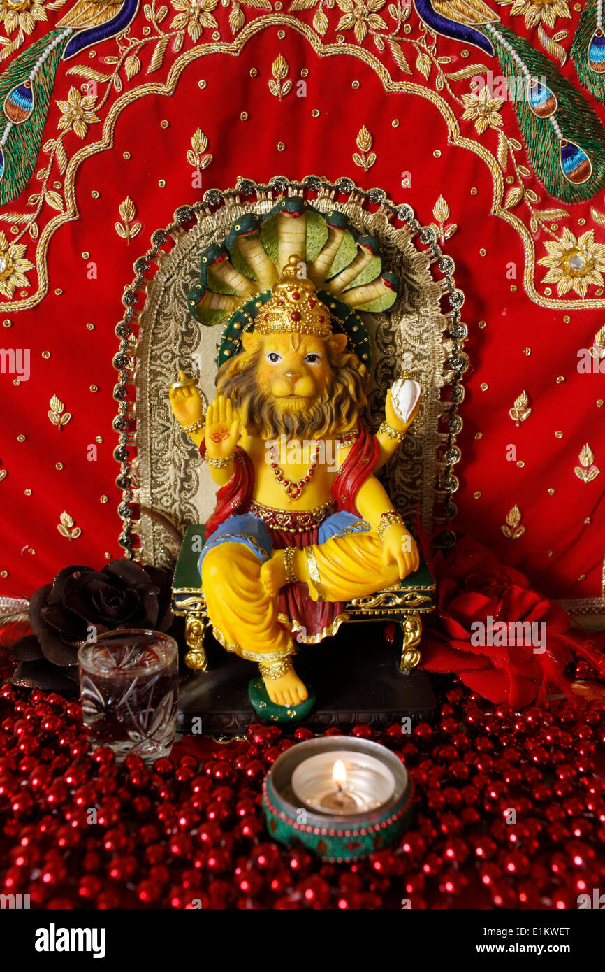 Nrsimha statue in ISKCON temple Stock Photo - Alamy