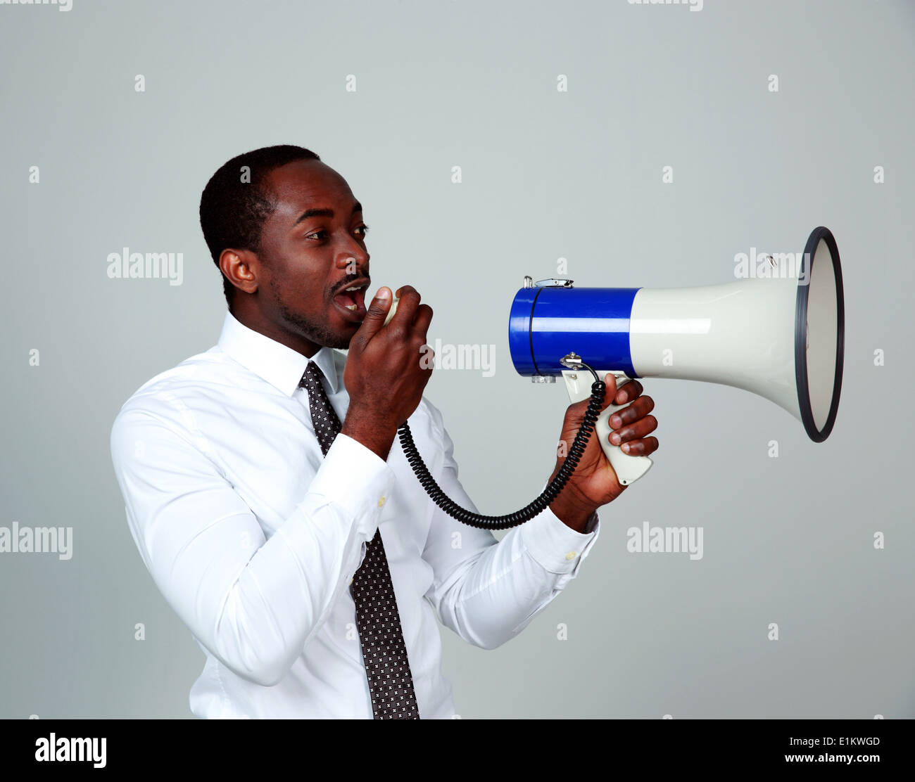 Businessman speaking through megaphone hi-res stock photography and ...