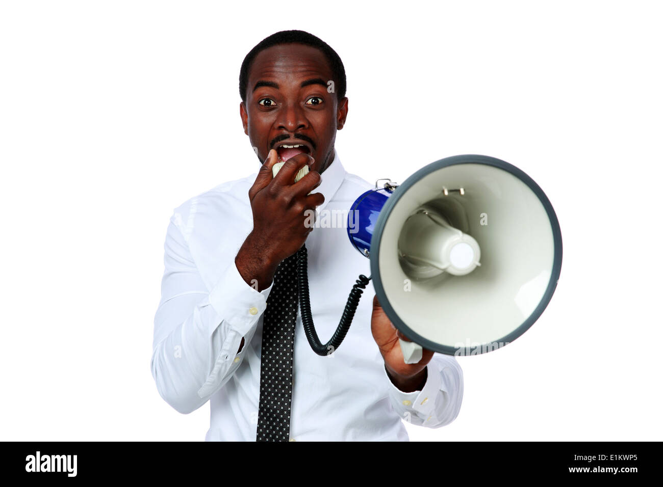 African man yelling through a megaphone isolated on a white background ...
