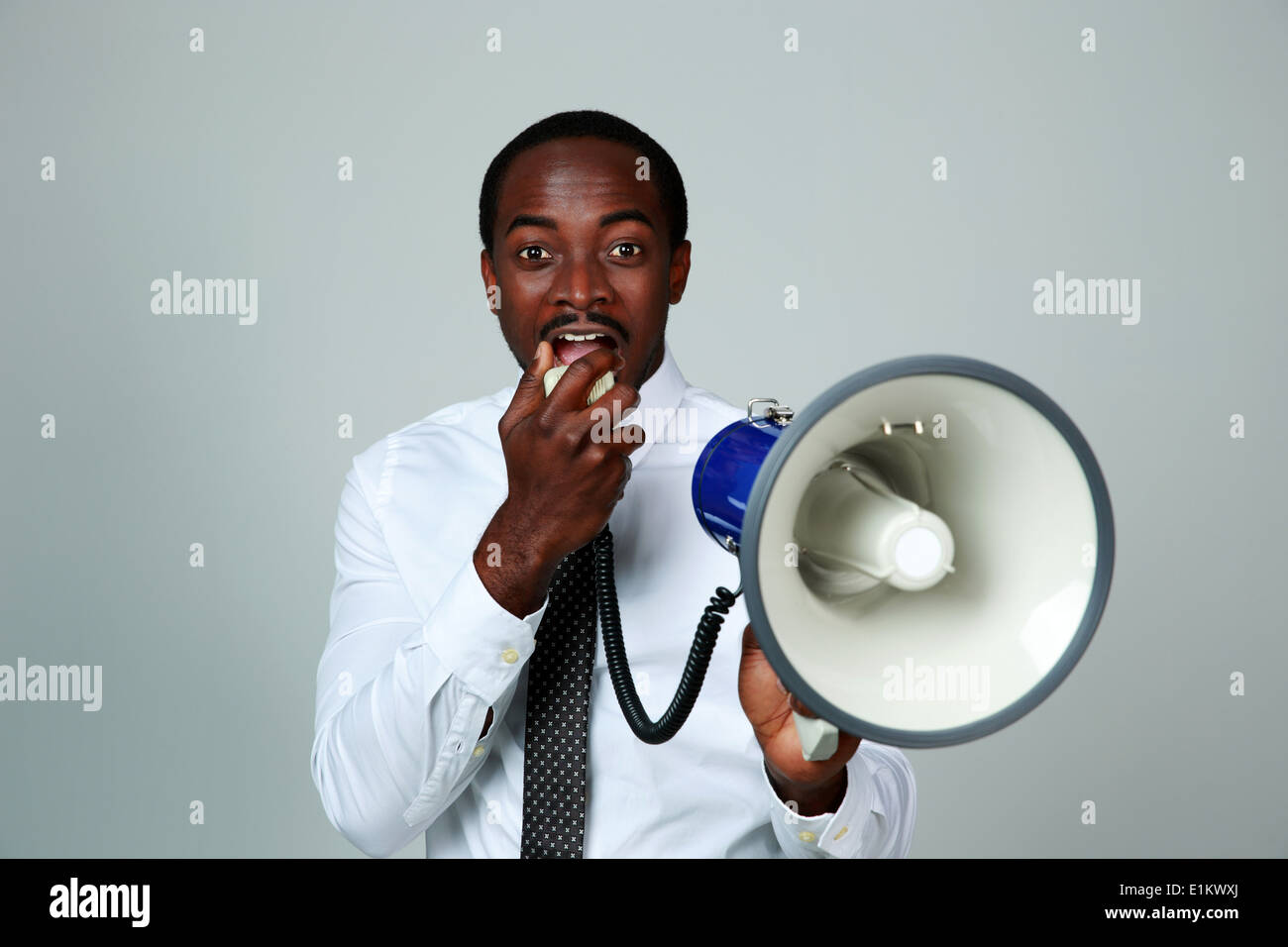 Businessman speaking through megaphone hi-res stock photography and ...