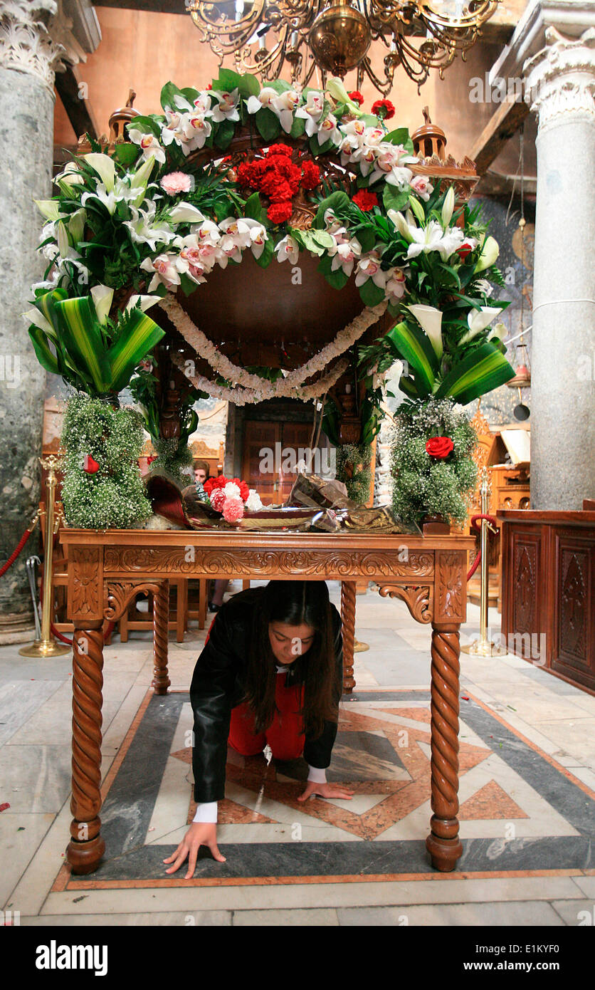 Greek orthodox devotee under the epitaphios on Good friday Stock Photo ...