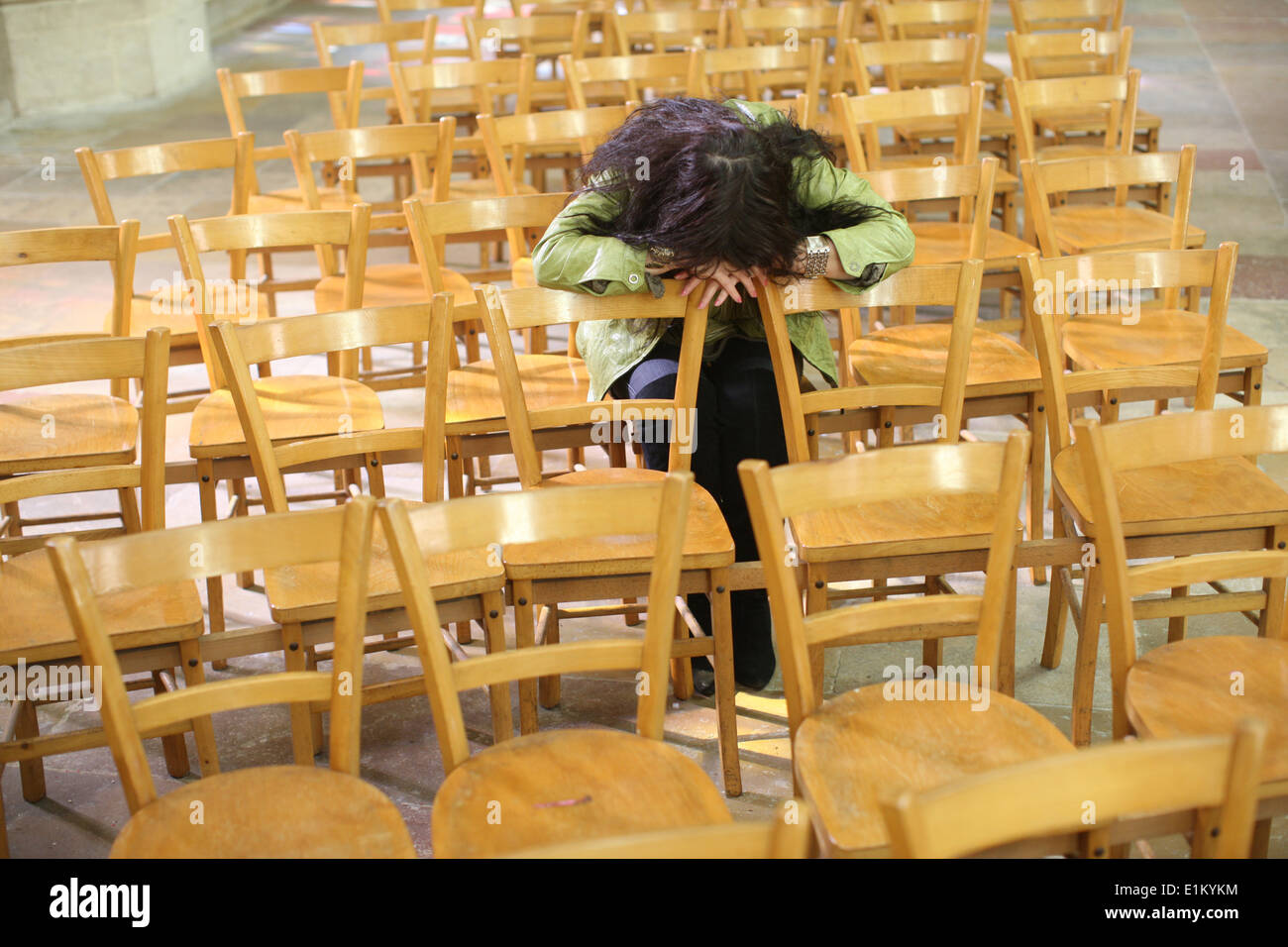 Woman praying in church hi-res stock photography and images - Alamy