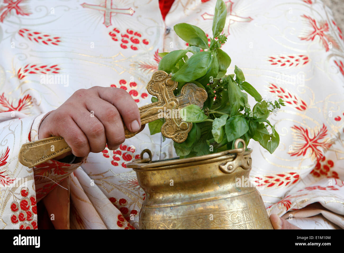 Melkite priest celebrating the feast of the cross Stock Photo - Alamy