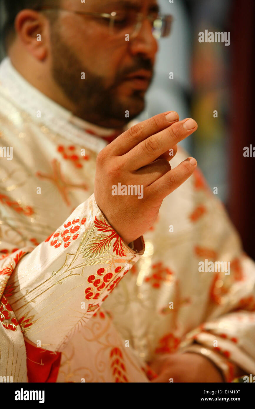 Melkite priest celebrating mass Stock Photo - Alamy