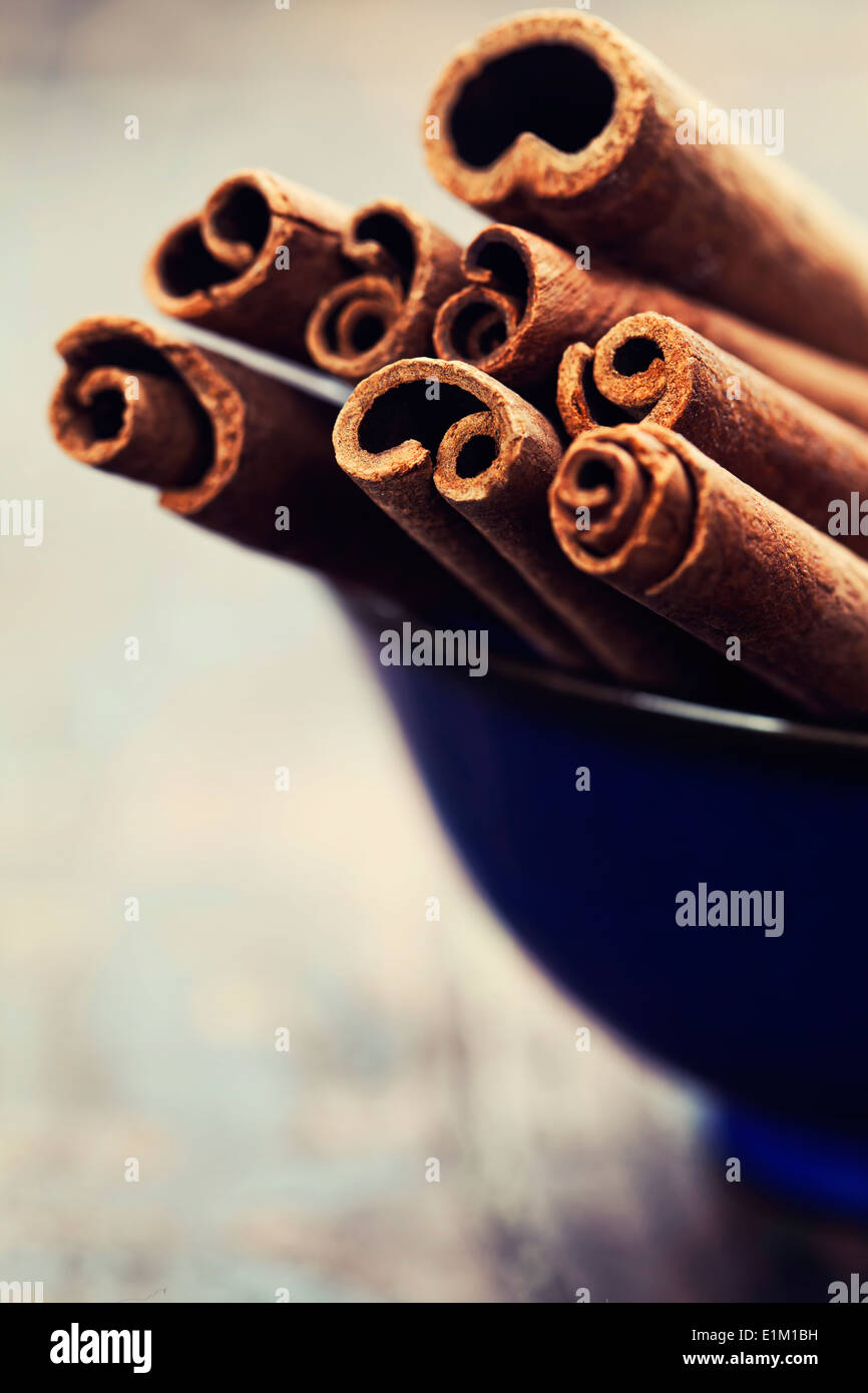 Cinnamon sticks wooden bowl hi-res stock photography and images - Alamy