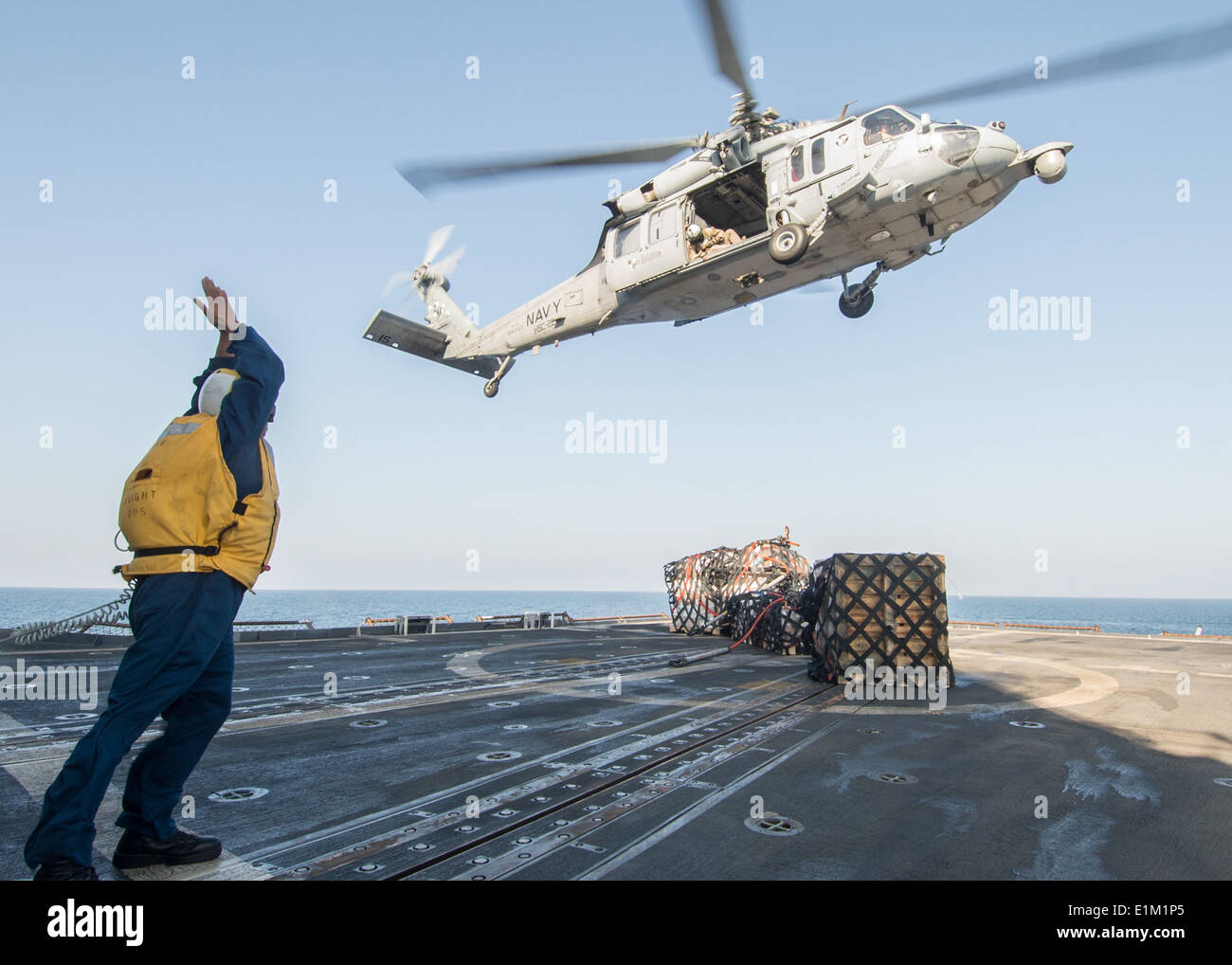 U.S. Navy Boatswain's Mate 2nd Class Shane Hempfield, assigned to the ...