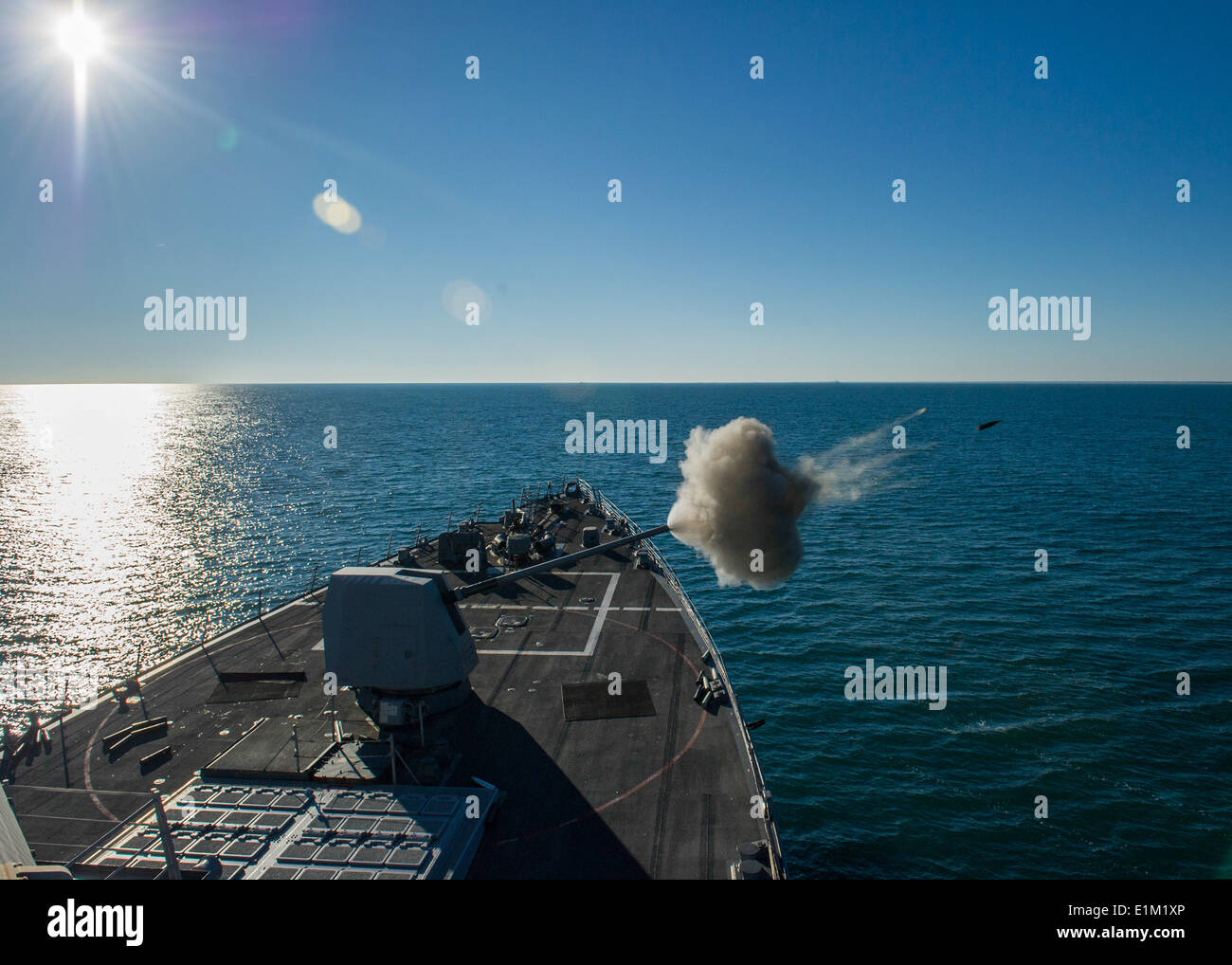 The forward Mark 45 5-inch gun aboard the guided missile destroyer USS ...