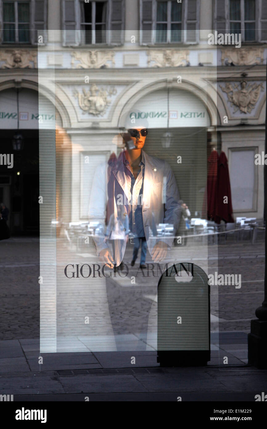 Reflection in an Armani shop window Stock Photo - Alamy