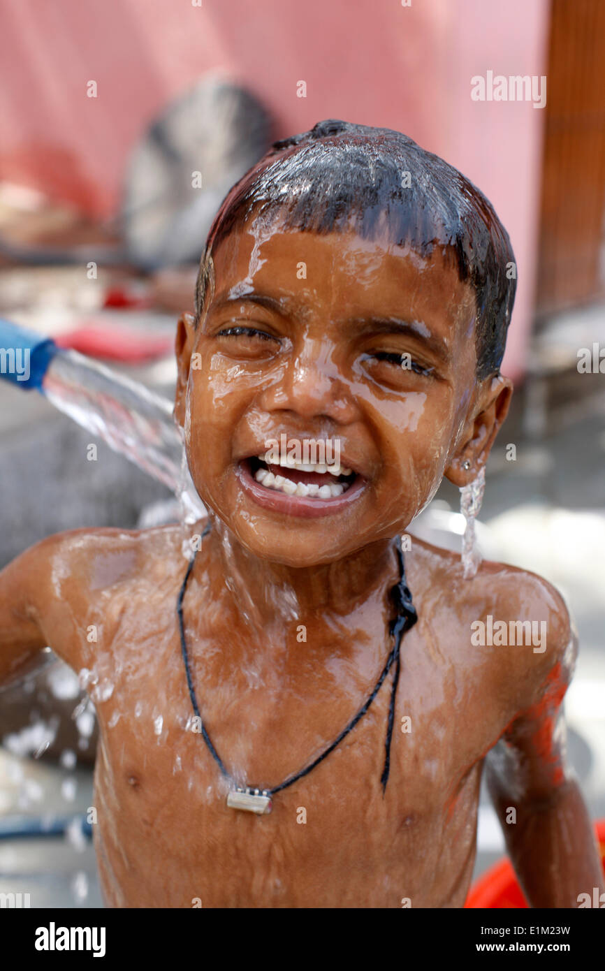 Boy having a wash Stock Photo - Alamy