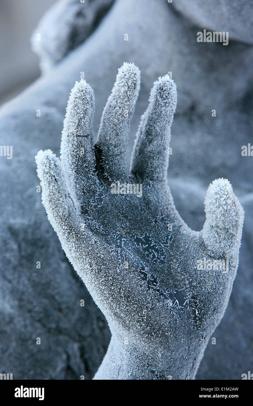 Milano monumental cemetery. Frozen hand Stock Photo - Alamy