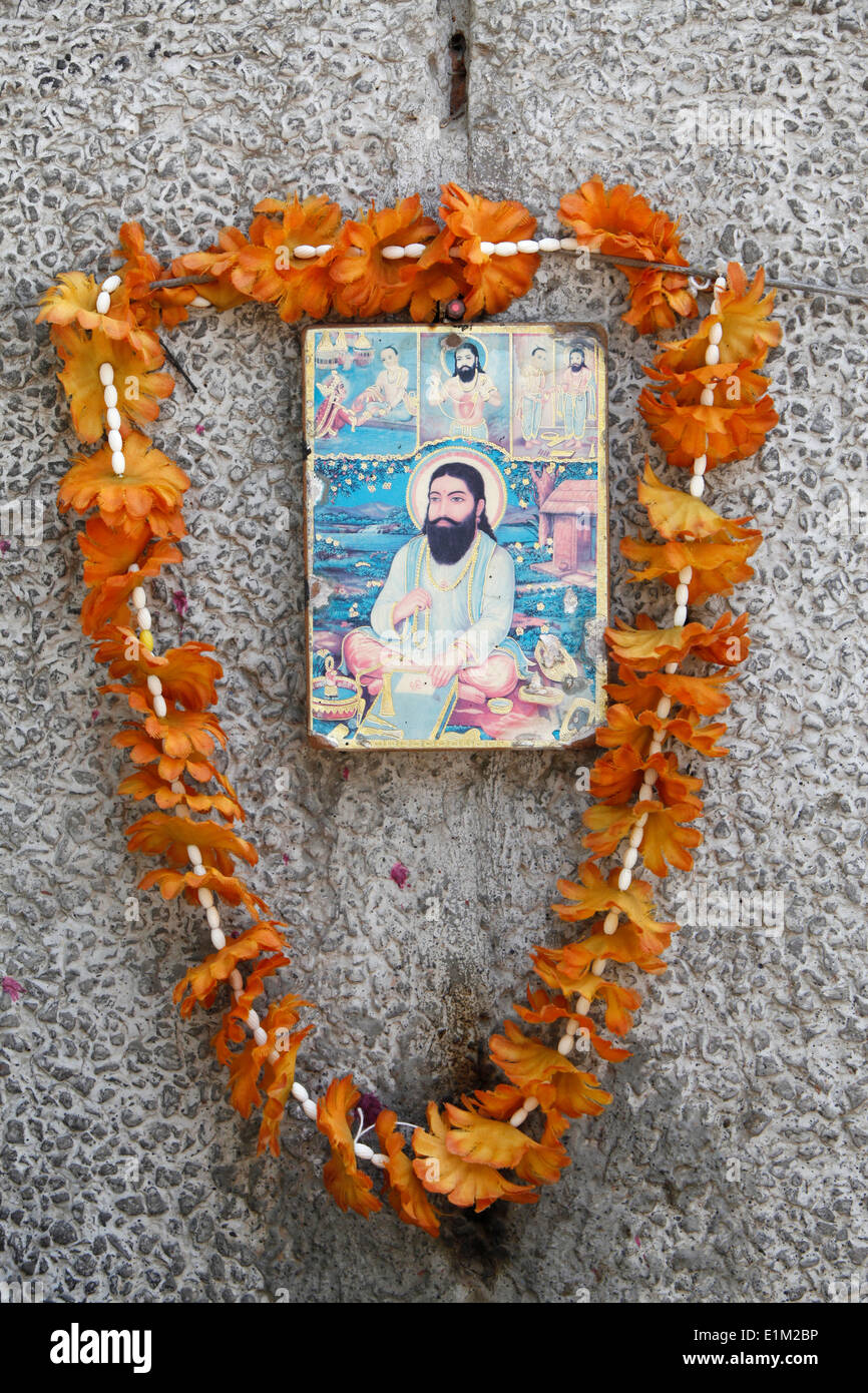 Garlanded guru image Stock Photo - Alamy