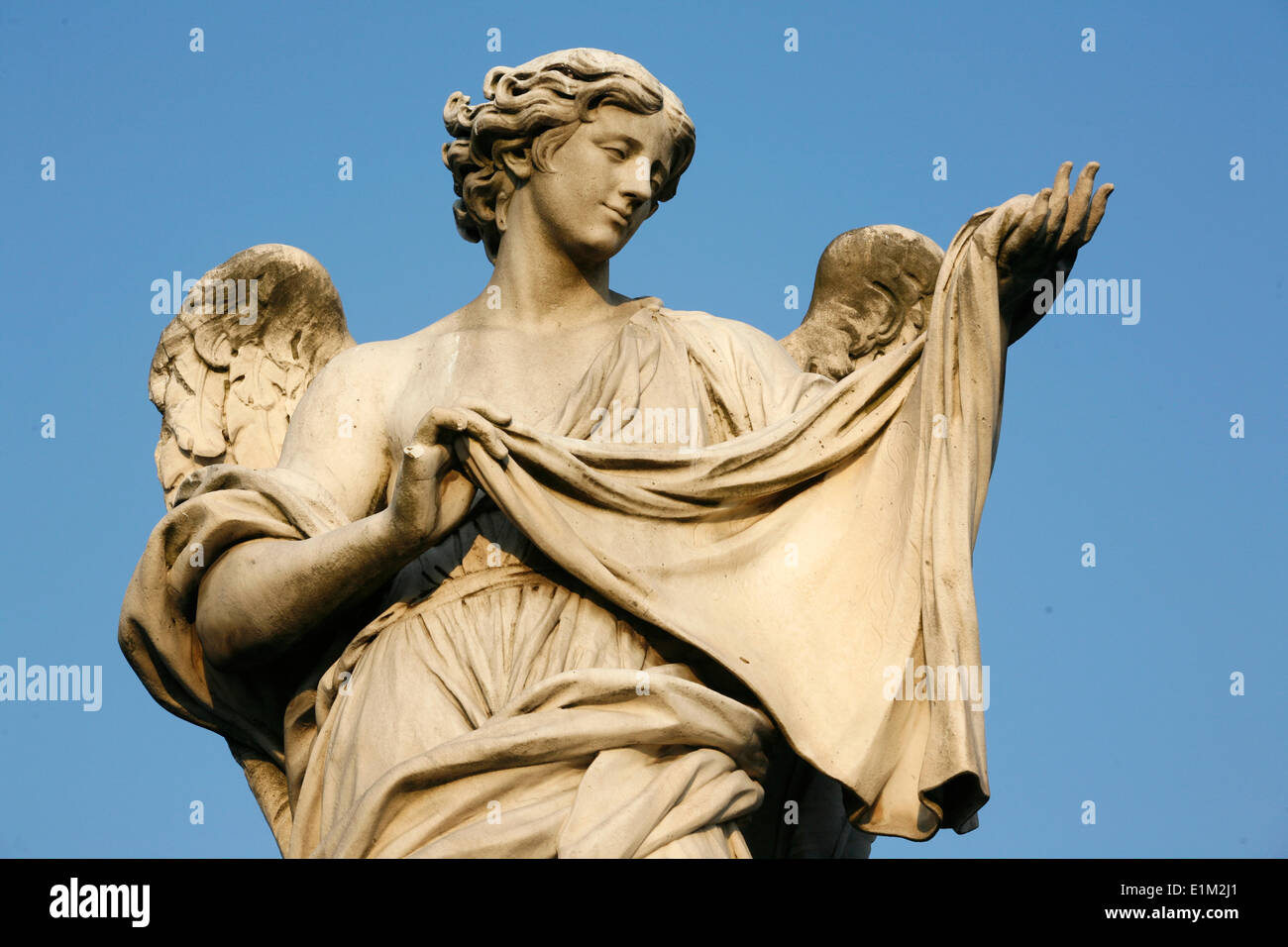 Saint Angelo bridge statue : Angel carrying Christ's shroud Stock Photo ...