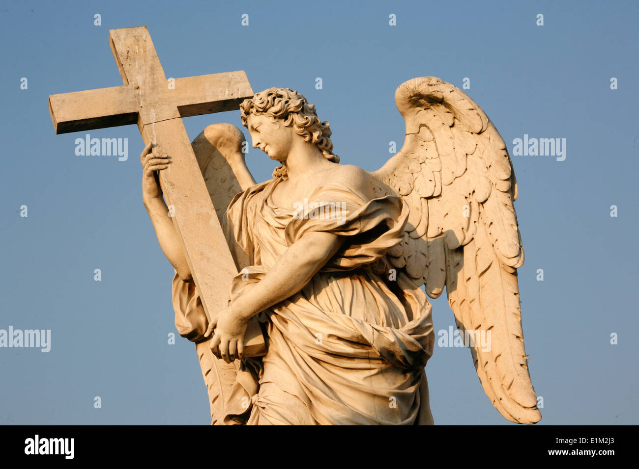Saint Angelo bridge statue : Angel carrying cross Stock Photo - Alamy