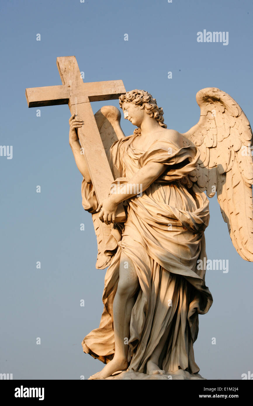 Saint Angelo bridge statue : Angel carrying cross Stock Photo - Alamy