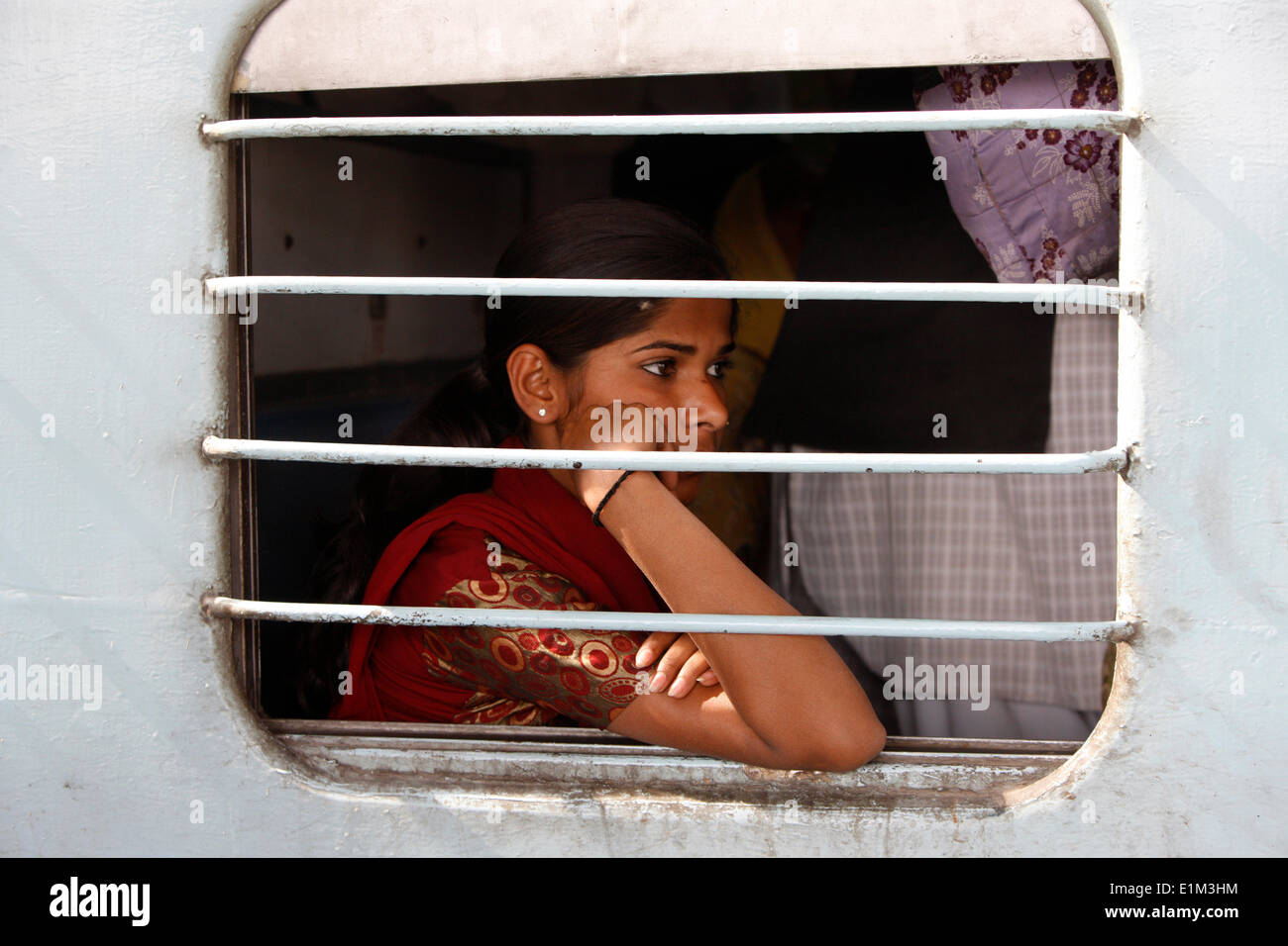 Indian woman train passenger station hi-res stock photography and ...