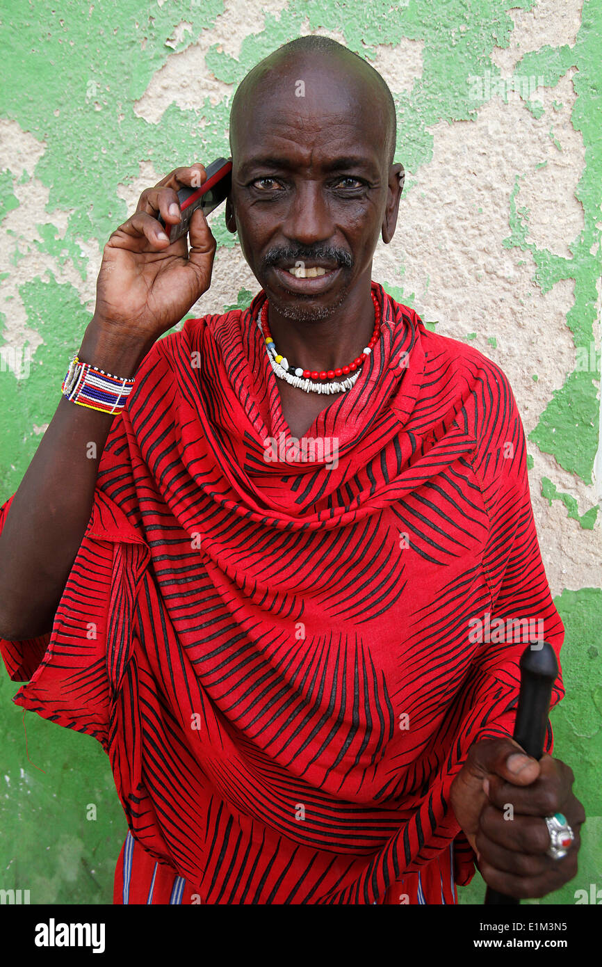 Massai using a mobile phone Stock Photo - Alamy