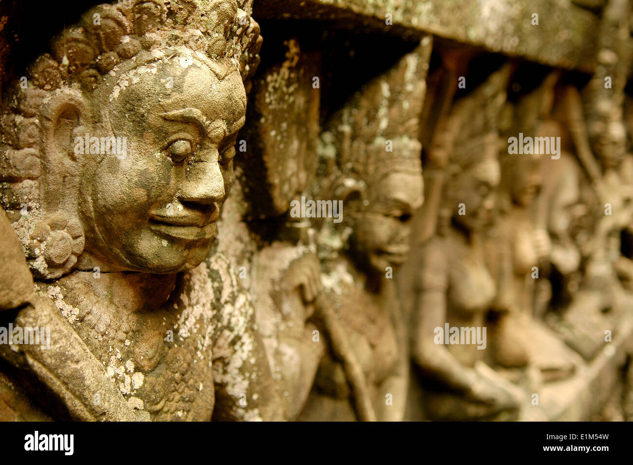 Daemon statues in Angkor Stock Photo - Alamy