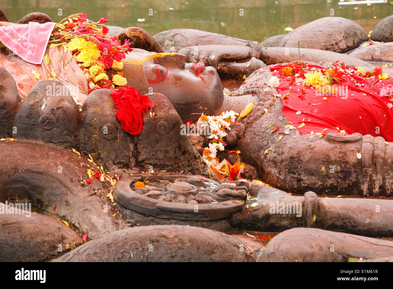 Vishnu lying on naga snakes at Buddha Nilkantha temple Stock Photo - Alamy