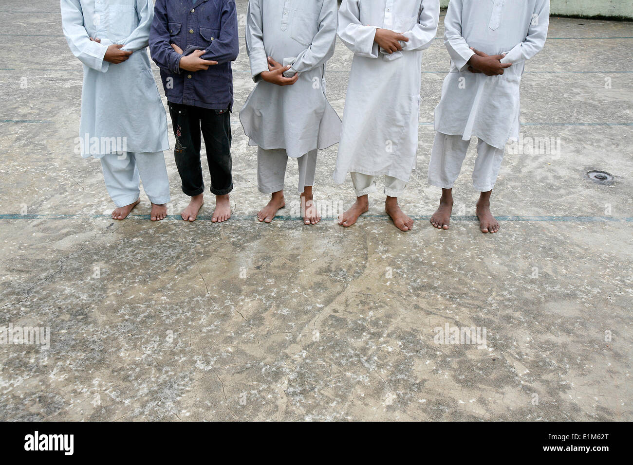 Muslim boys praying Stock Photo - Alamy