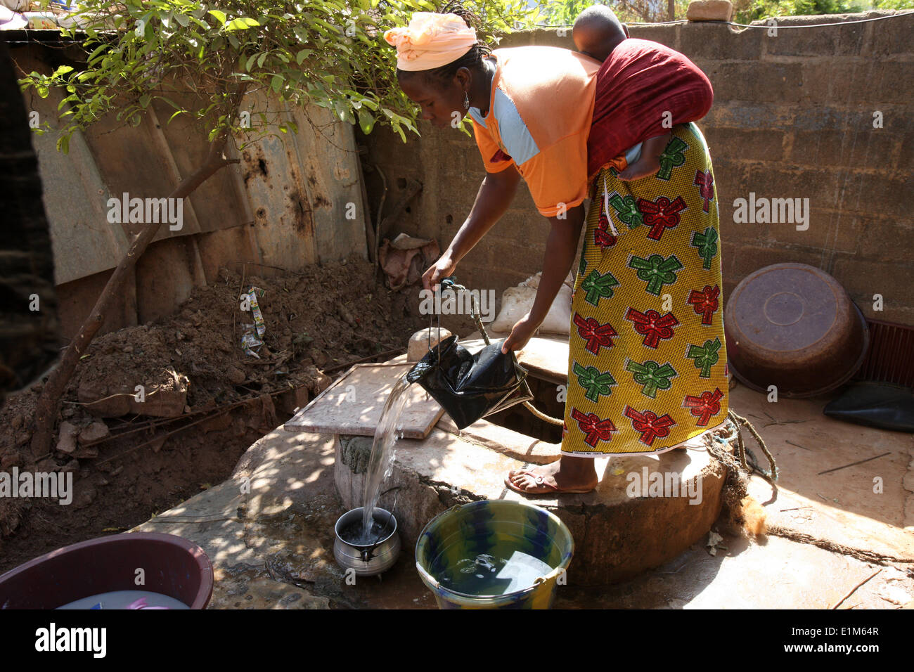 Water well in an African house Stock Photo - Alamy