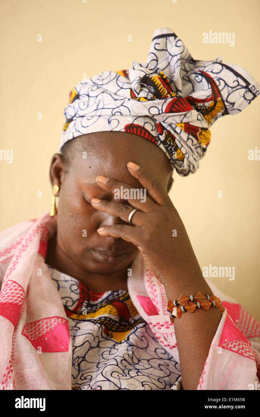 Sad african woman Stock Photo - Alamy
