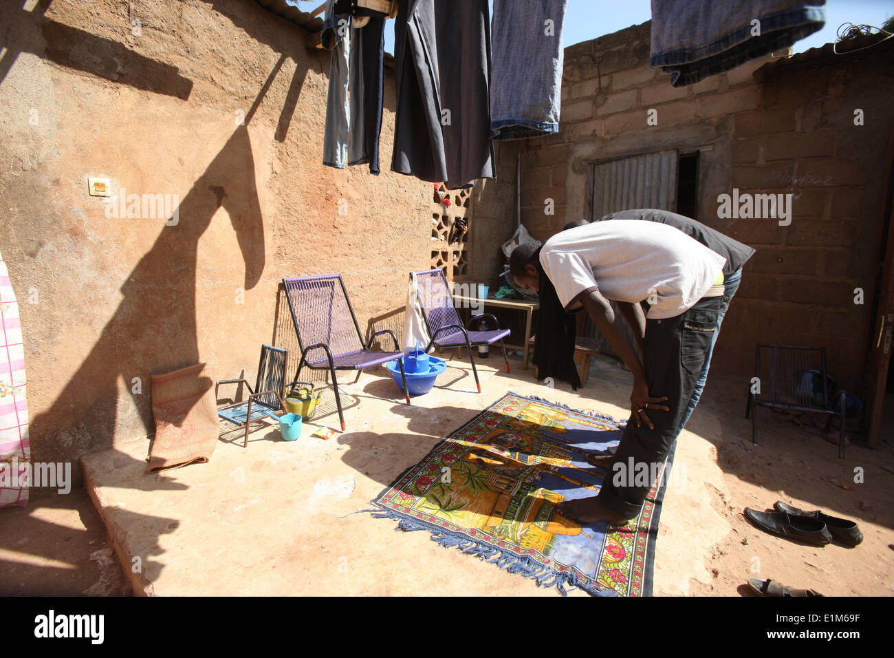 African men praying at home Stock Photo - Alamy