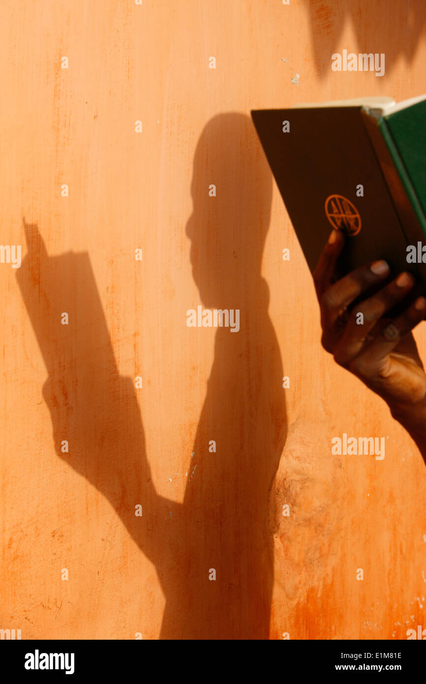 African man reading the bible Stock Photo - Alamy